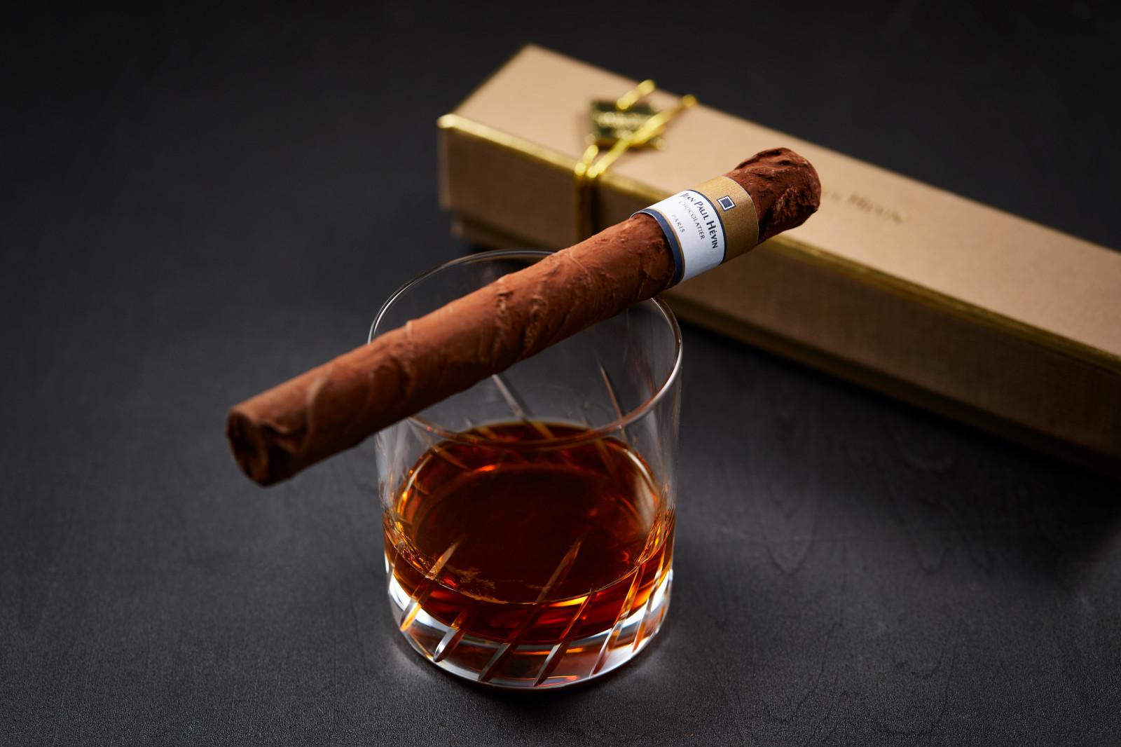 An elaborate and elegant cigar-shaped chocolate. JEAN-PAUL HEVIN's ...